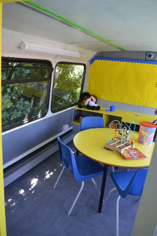 Phelan volunteers transform a bus into a school library! - Phelan ...