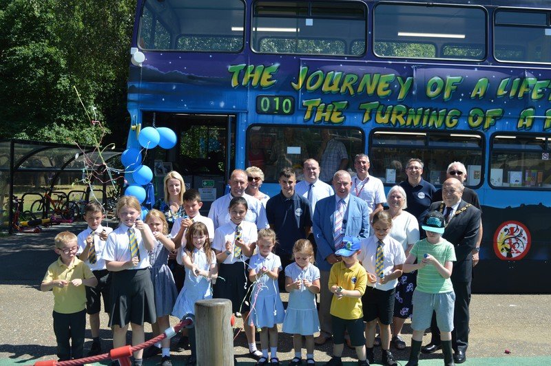 Phelan volunteers transform a bus into a school library! - Phelan ...