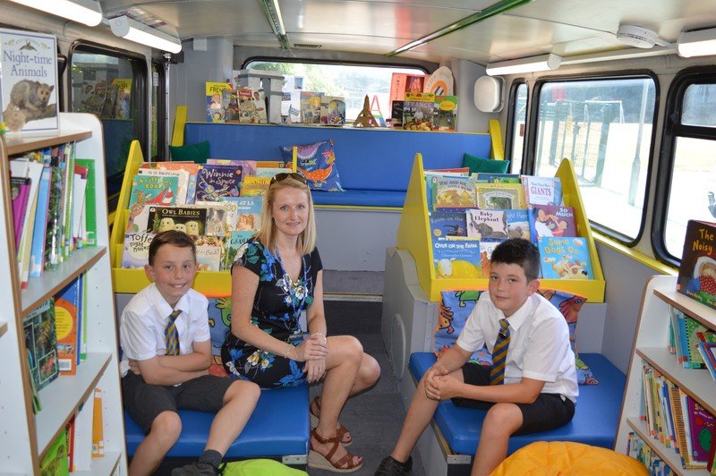 Phelan volunteers transform a bus into a school library! - Phelan ...